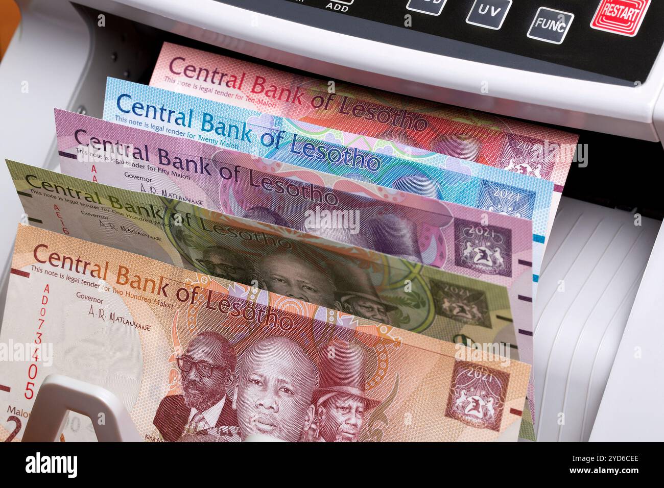 Lesotho money - Maloti in a counting machine Stock Photo - Alamy