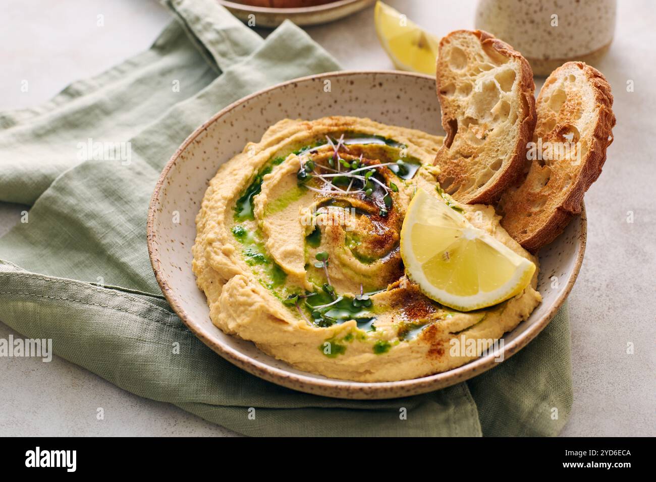 Delicious homemade hummus with lemon, paprika, olive oil and ...