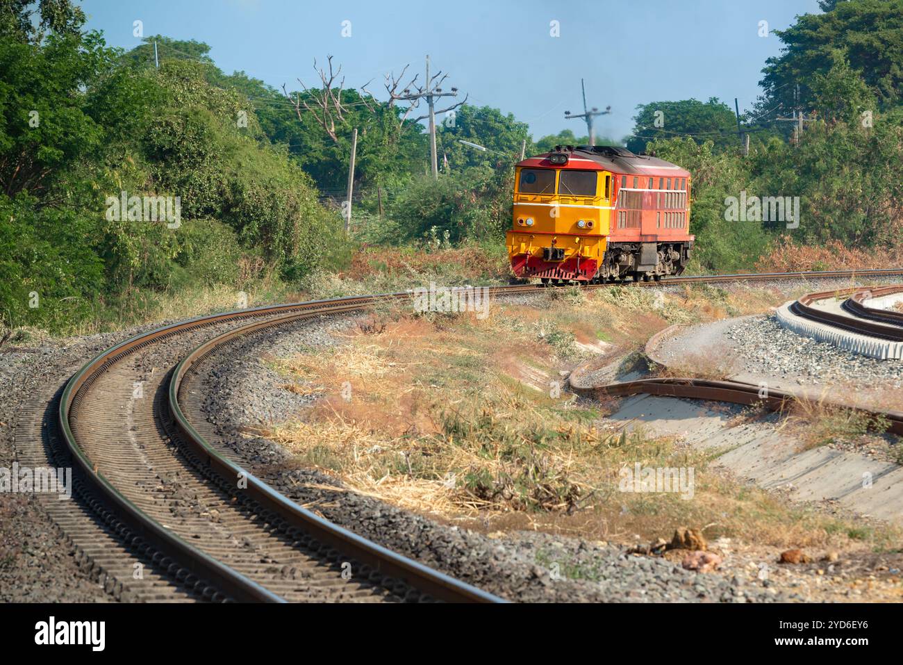 Old Train Yellow and Orange Diesel Electric locomotives on the tracks of Thailand Stock Photo ...