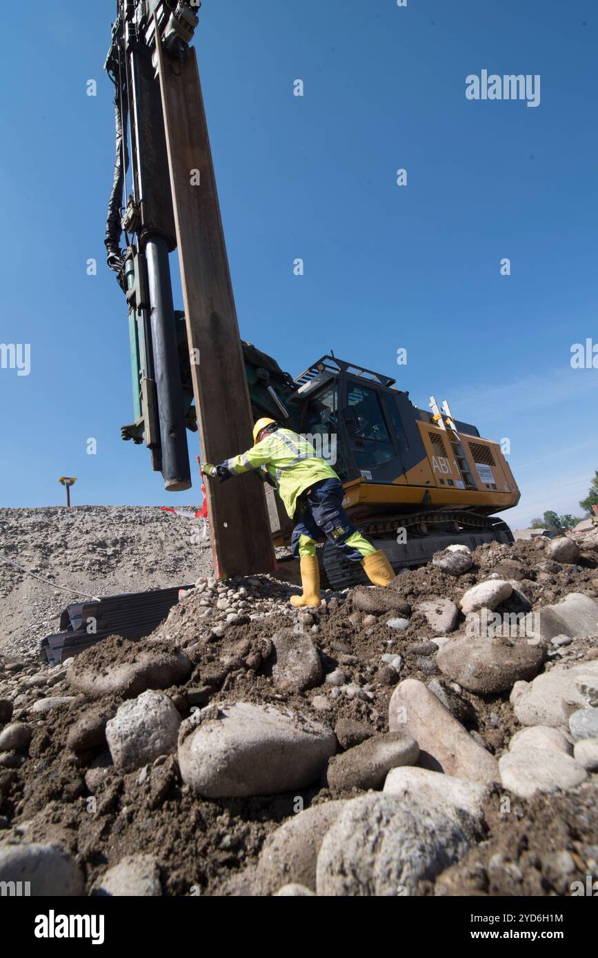 Excavator and digging in hydraulic engineering Stock Photo - Alamy