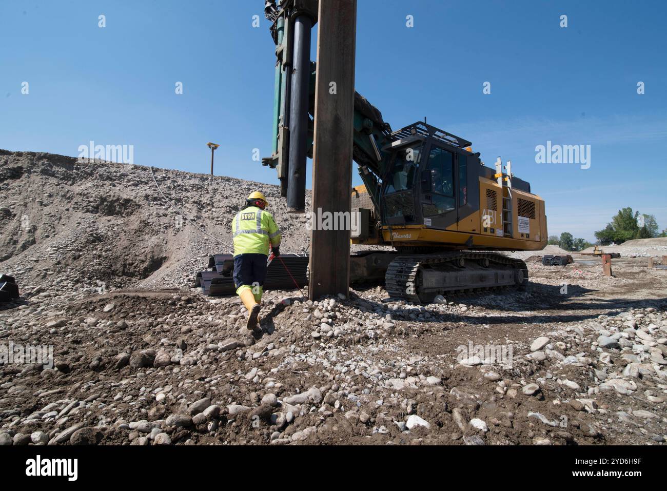 Excavator and digging in hydraulic engineering Stock Photo - Alamy