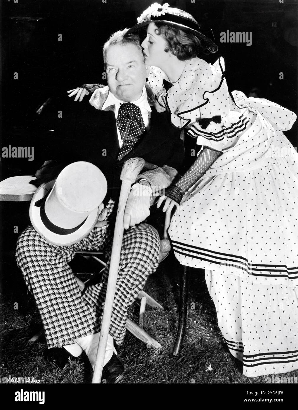 W.C. FIELDS and ROCHELLE HUDSON on set candid during filming of POPPY 1936 director A. EDWARD ...
