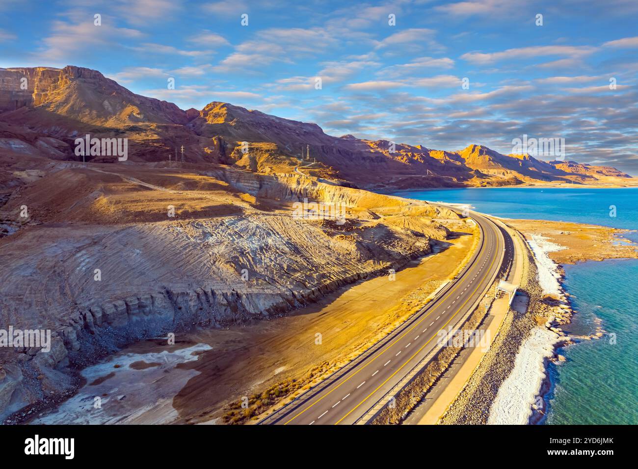 Shallowed Dead Sea photographed from a drone. Sunset. Evaporated salt ...