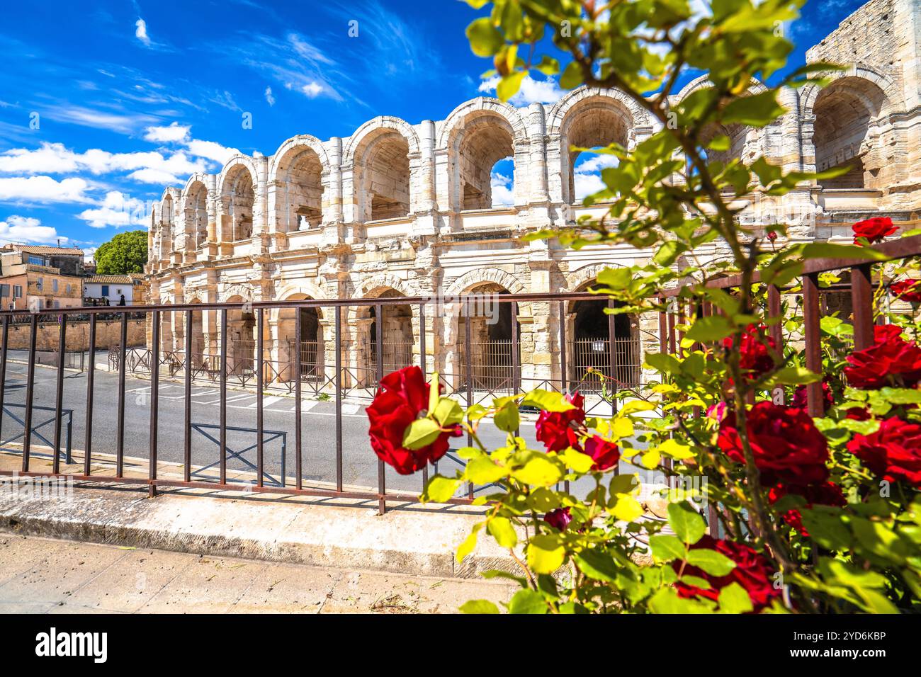 Arles Amphitheatre and colorful street architecture view Stock Photo - Alamy