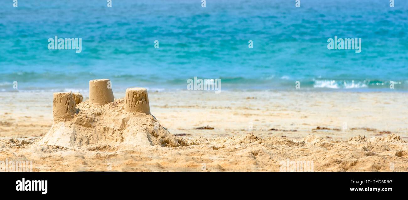 Sand Castle - on the beach by the sea coast Stock Photo - Alamy