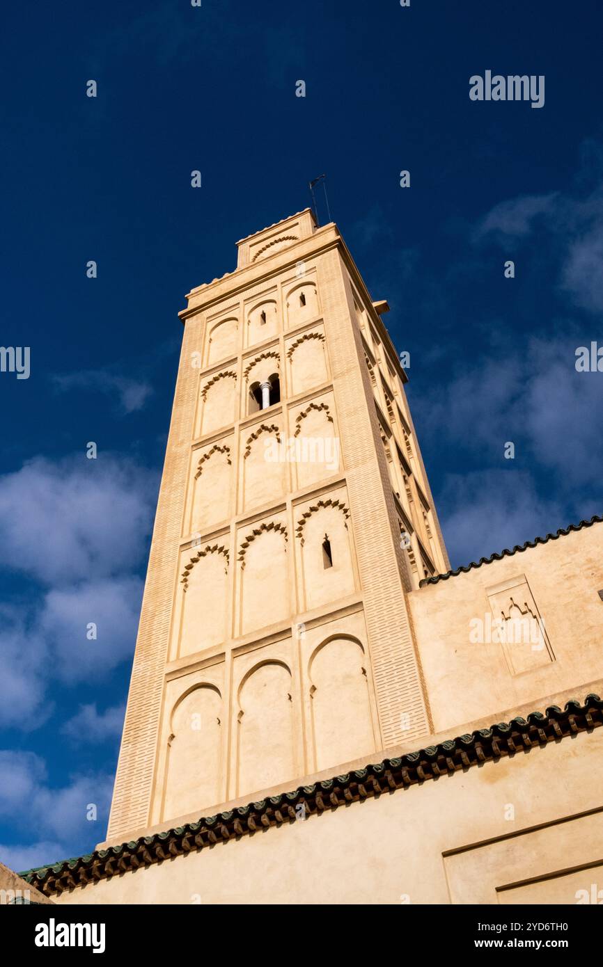 The minaret of the Zaytouna mosque in the medina of the city of Meknes ...
