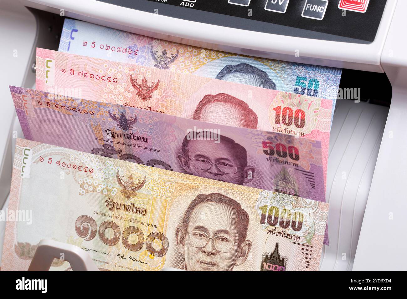 Thai baht in a counting machine Stock Photo - Alamy