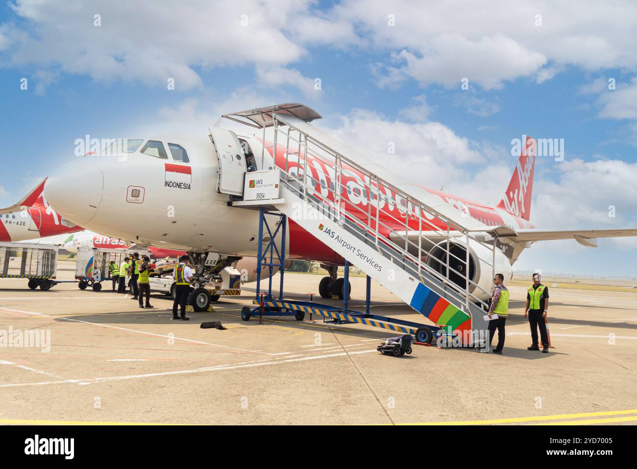 Empty Airstairs by JAS airport services at Airbus A320 of AirAsia, the ...