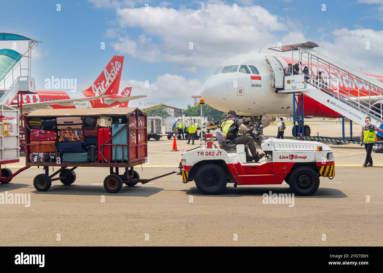 Luggage vehicle cart Baggage Towing Tractor by Lion Group delivering ...