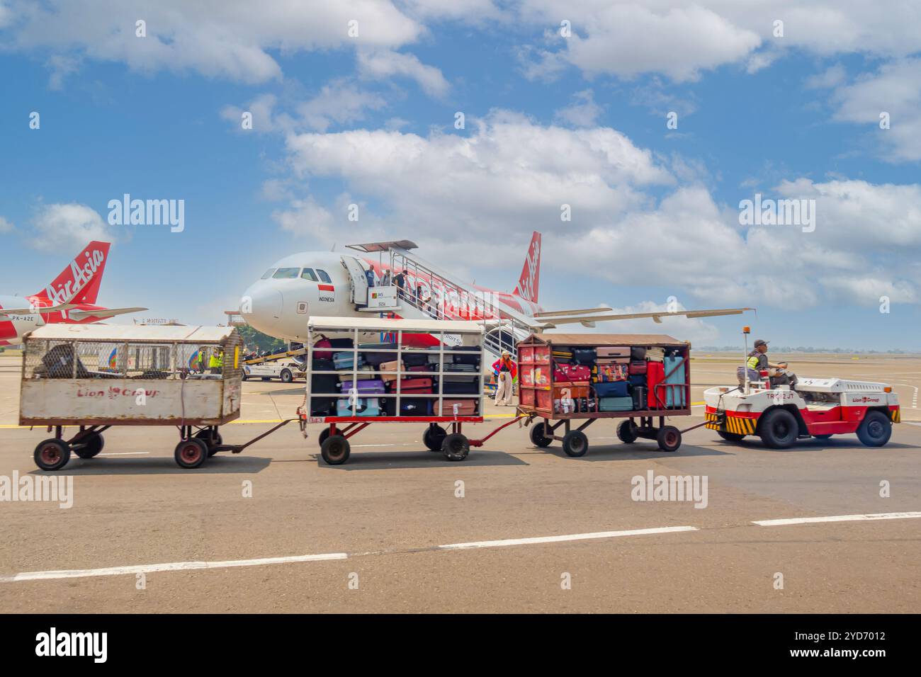 Luggage vehicle cart Baggage Towing Tractor by Lion Group delivering ...