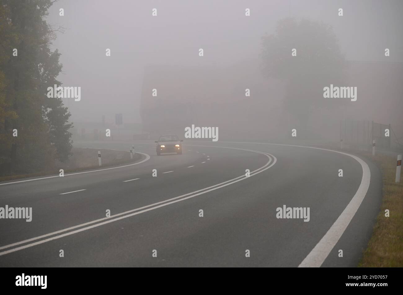 Cars in the fog. Bad winter weather and dangerous automobile traffic on ...