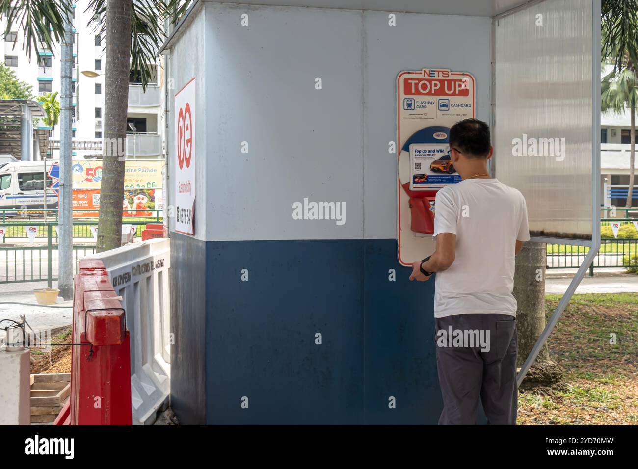 NETS Flashpay Top-up terminal road pass payment system Singapore. Man ...