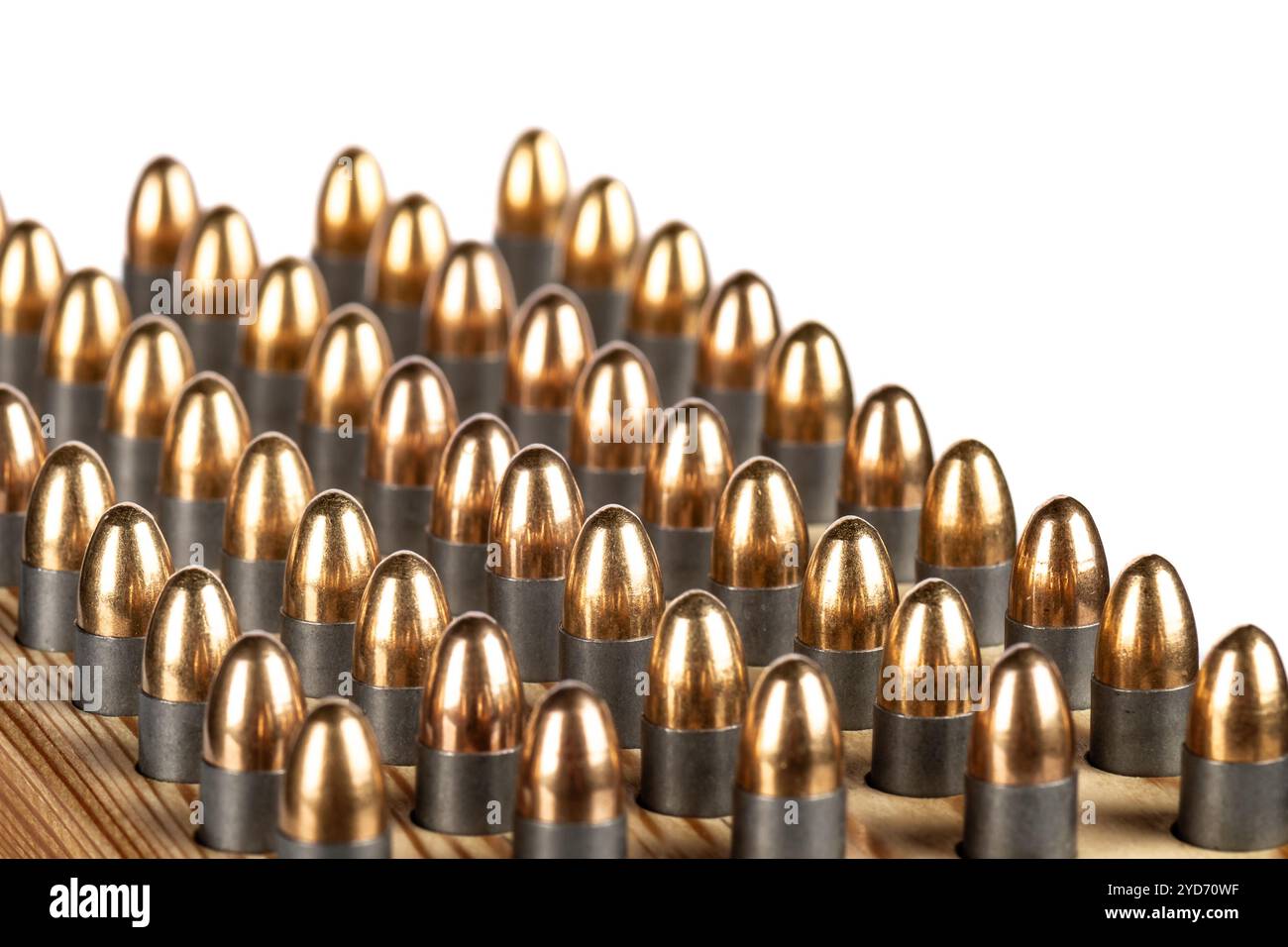 Golden brass Pistol caliber bullets in wooden case full filled view ...