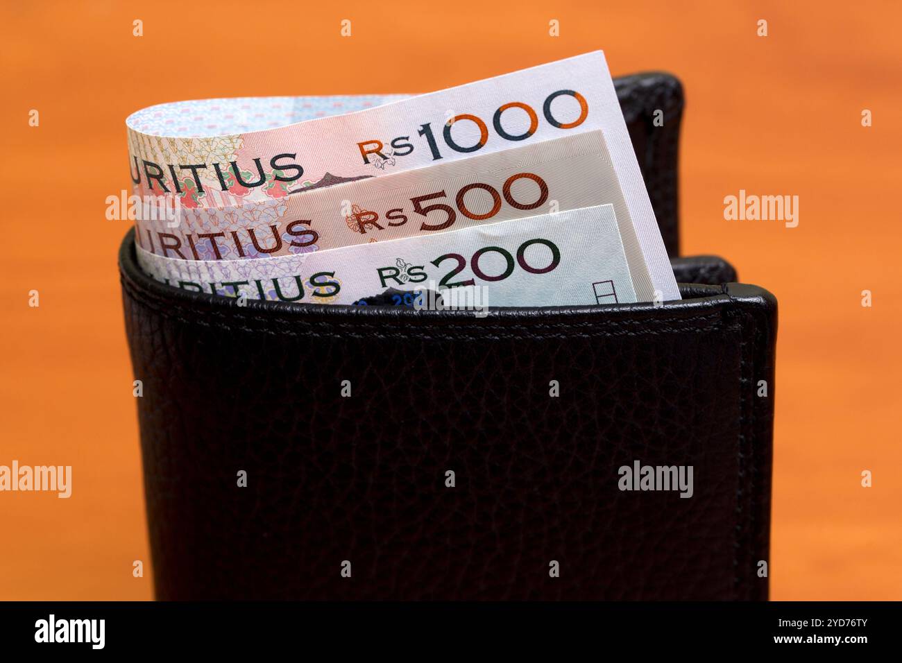 Mauritian rupee in the black wallet Stock Photo - Alamy