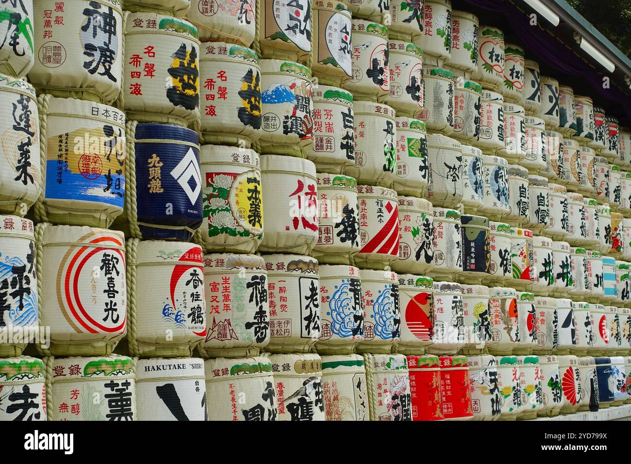 Decorative rows of sake barrels in Japan Stock Photo - Alamy