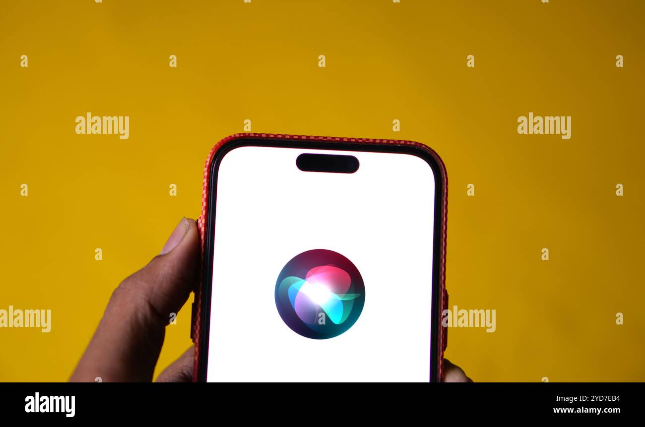 01 Jun 2024: Apple Siri logo is displayed on smartphone Stock Photo - Alamy