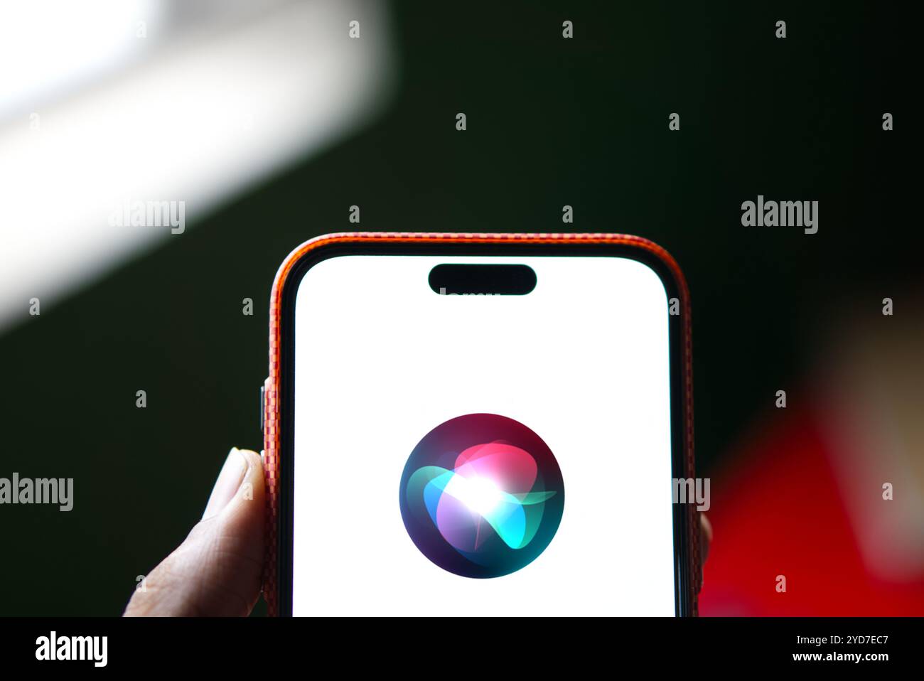01 Jun 2024: Apple Siri logo is displayed on smartphone Stock Photo - Alamy