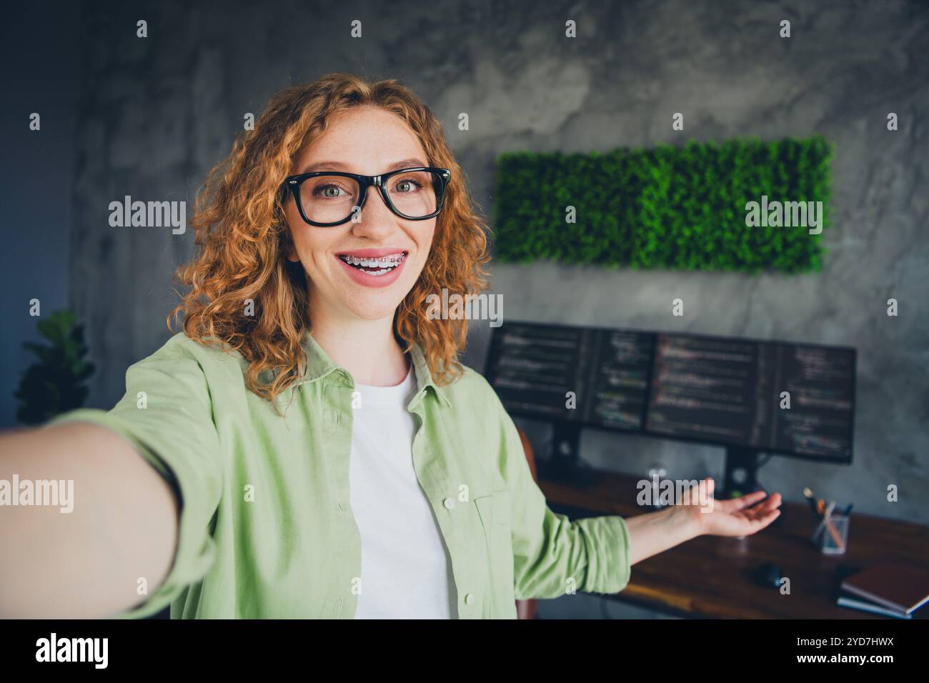 Portrait of young girl computer it specialist take selfie show computer ...