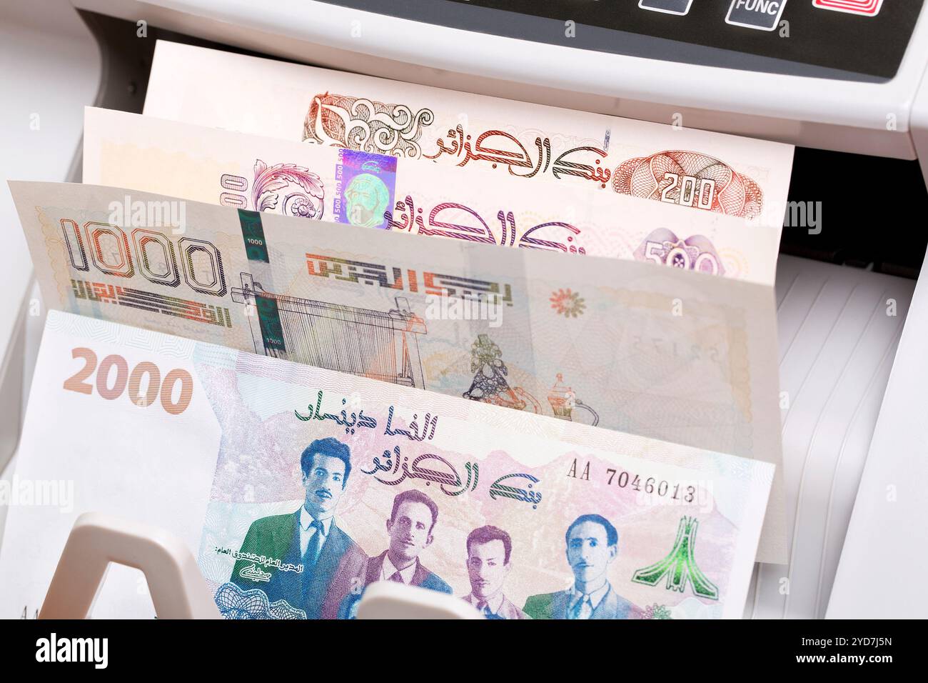Algerian dinar in a counting machine Stock Photo - Alamy