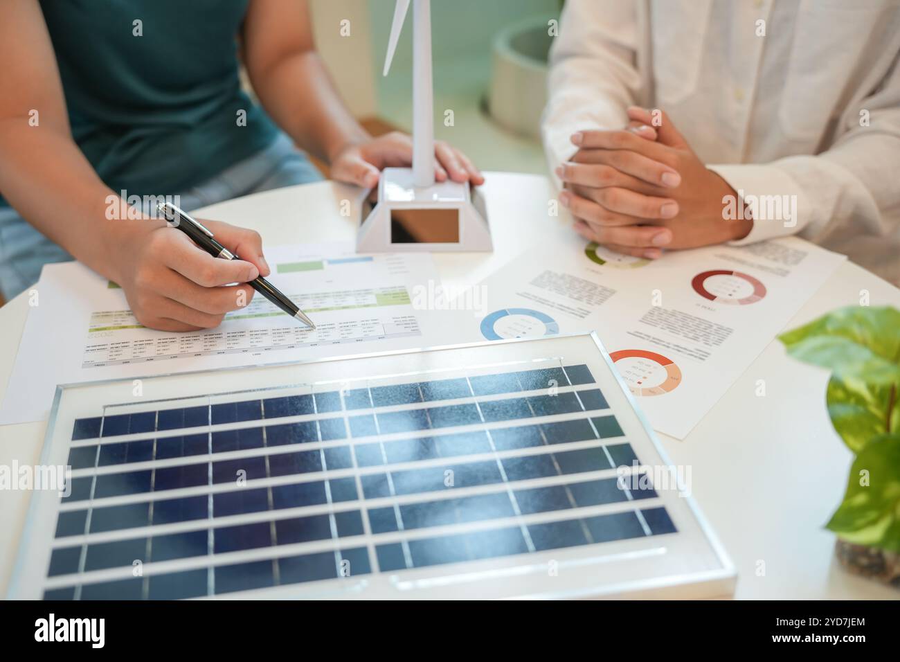 Solar panels green energy Business people working in green eco friendly ...