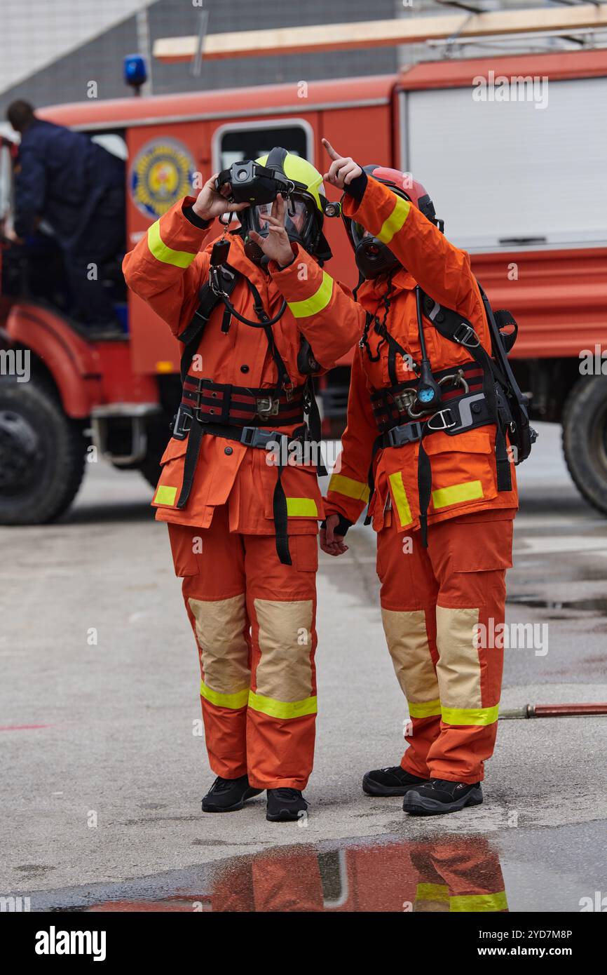 A group of firefighters undergoes training to learn how to effectively ...