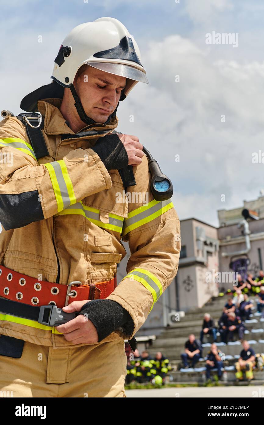A firefighter dons the essential components of their professional gear ...