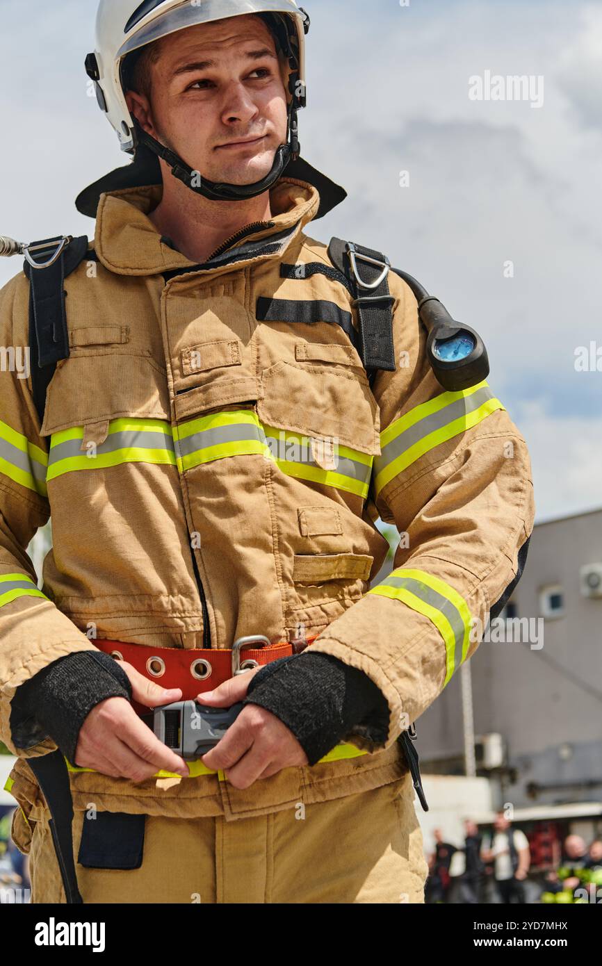 A firefighter dons the essential components of their professional gear ...