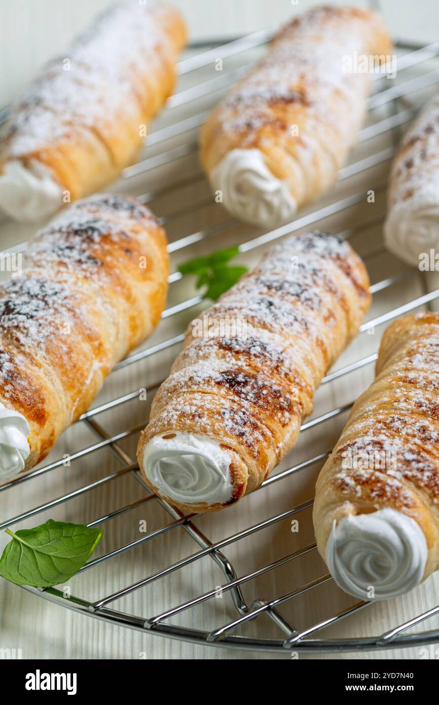 Homemade puff cones with cream Stock Photo - Alamy