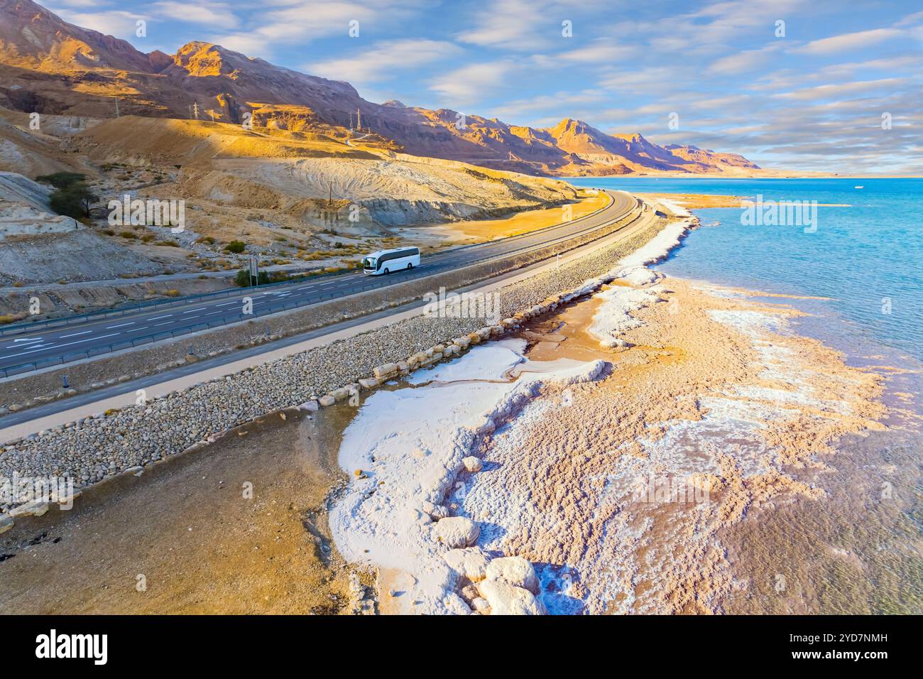 Asphalt highway runs along the seashore. Dead Sea, Israel. Shallowed ...