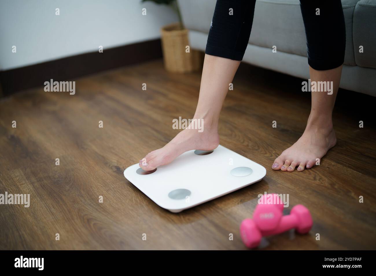 Fat diet and scale feet standing on electronic scales for weight ...