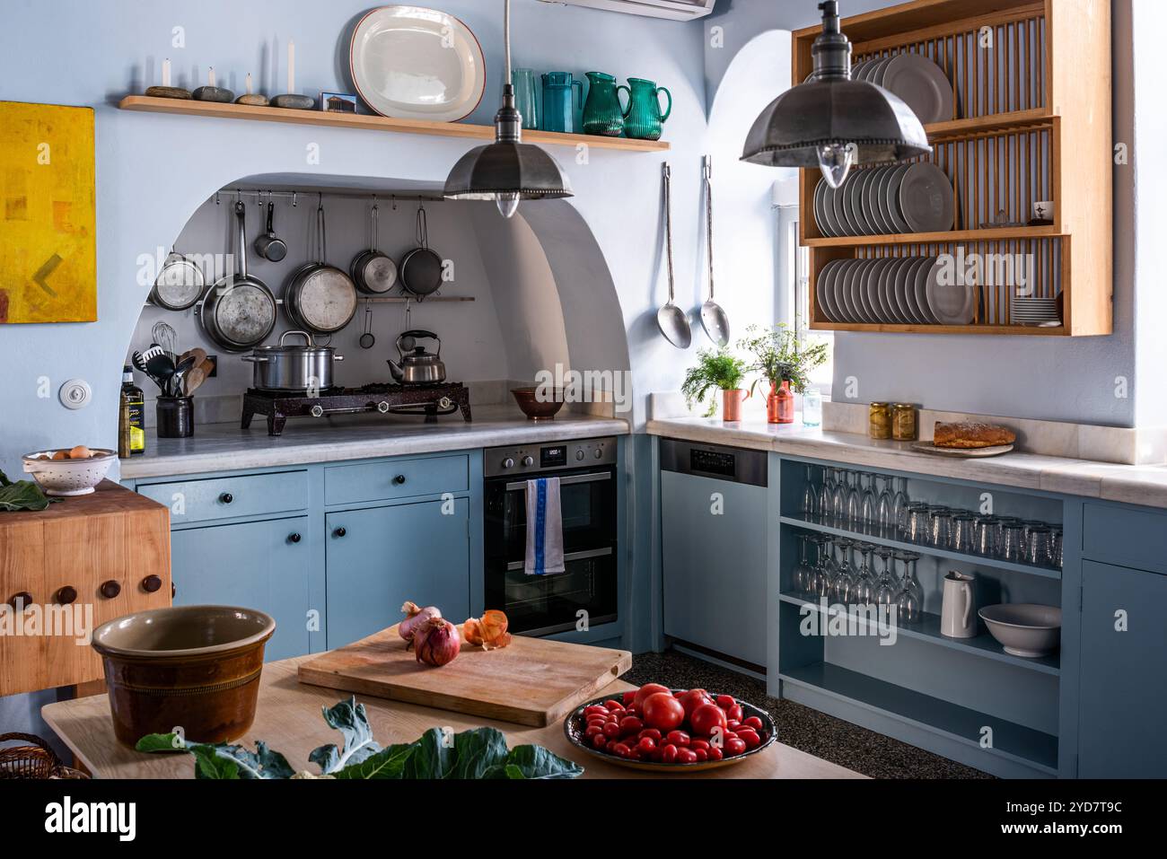 Modern renovated kitchen with plate rack in historic house on the ...