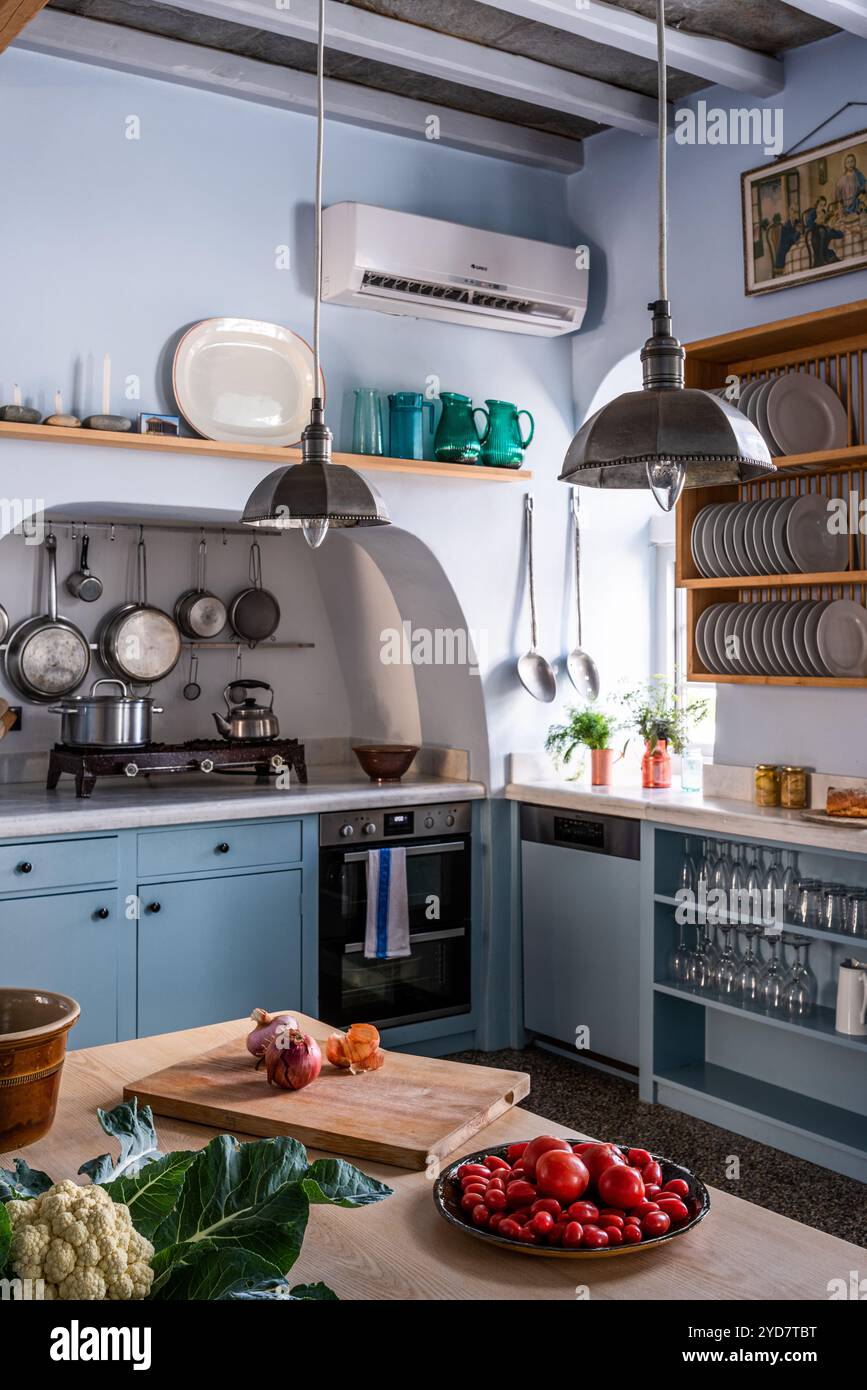 Modern renovated kitchen with plate rack in historic house on the ...