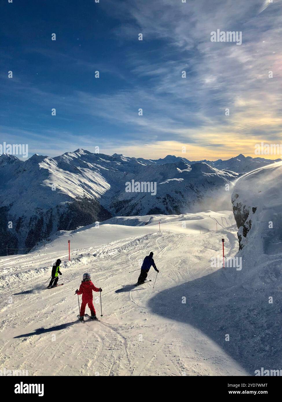 Skiing vacation with family in the Swiss alps Stock Photo - Alamy
