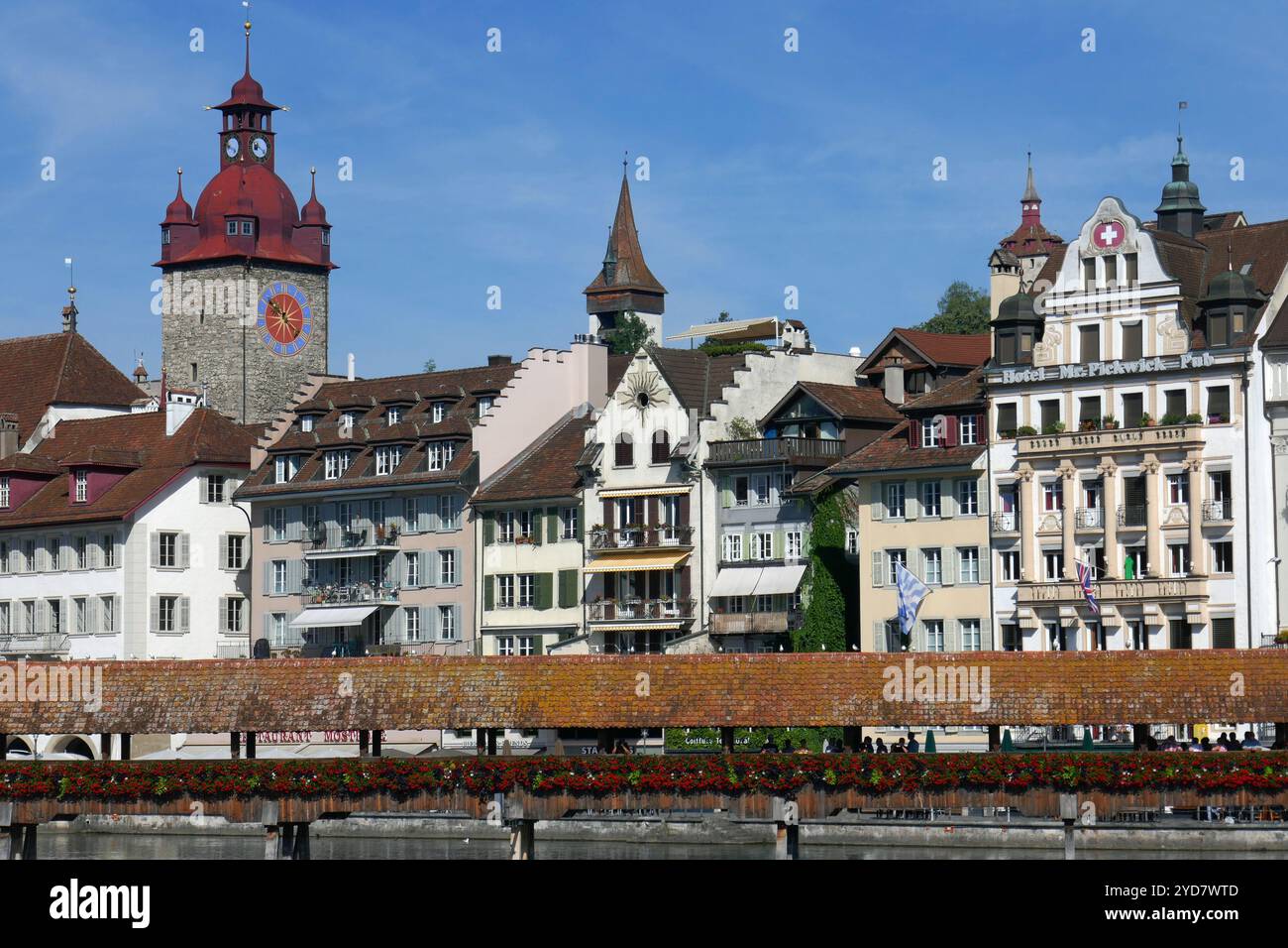 Chapel bridge with town hall tower in Lucerne, Switzerland Stock Photo ...