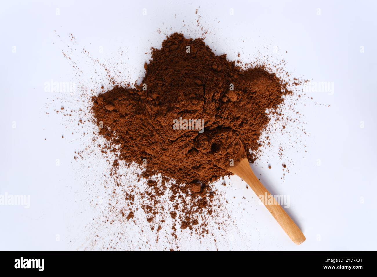 Cocoa powder with wooden spoon on white background Stock Photo - Alamy