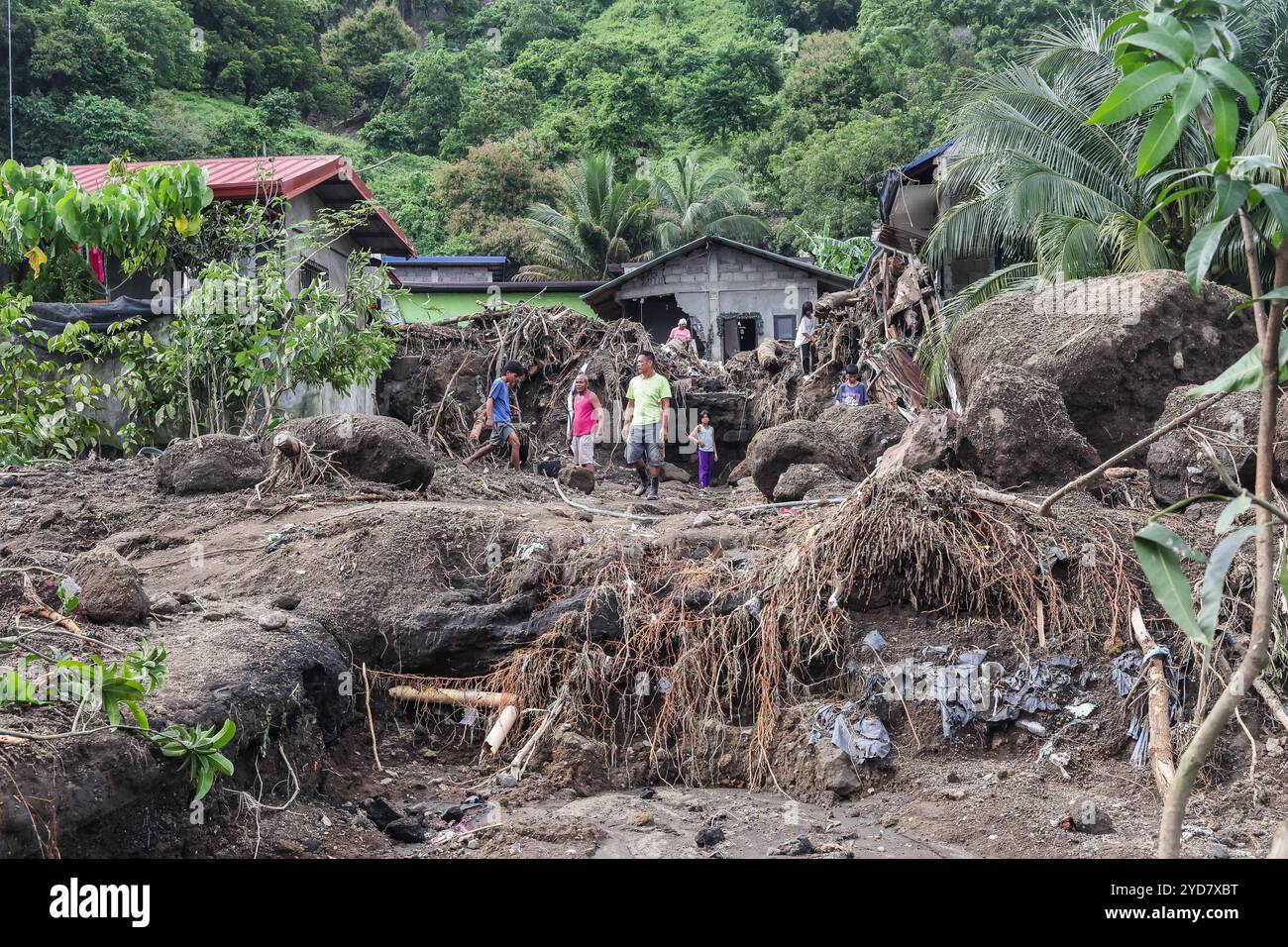 Batangas Province, Philippines. 25th Oct, 2024. Residents return to ...