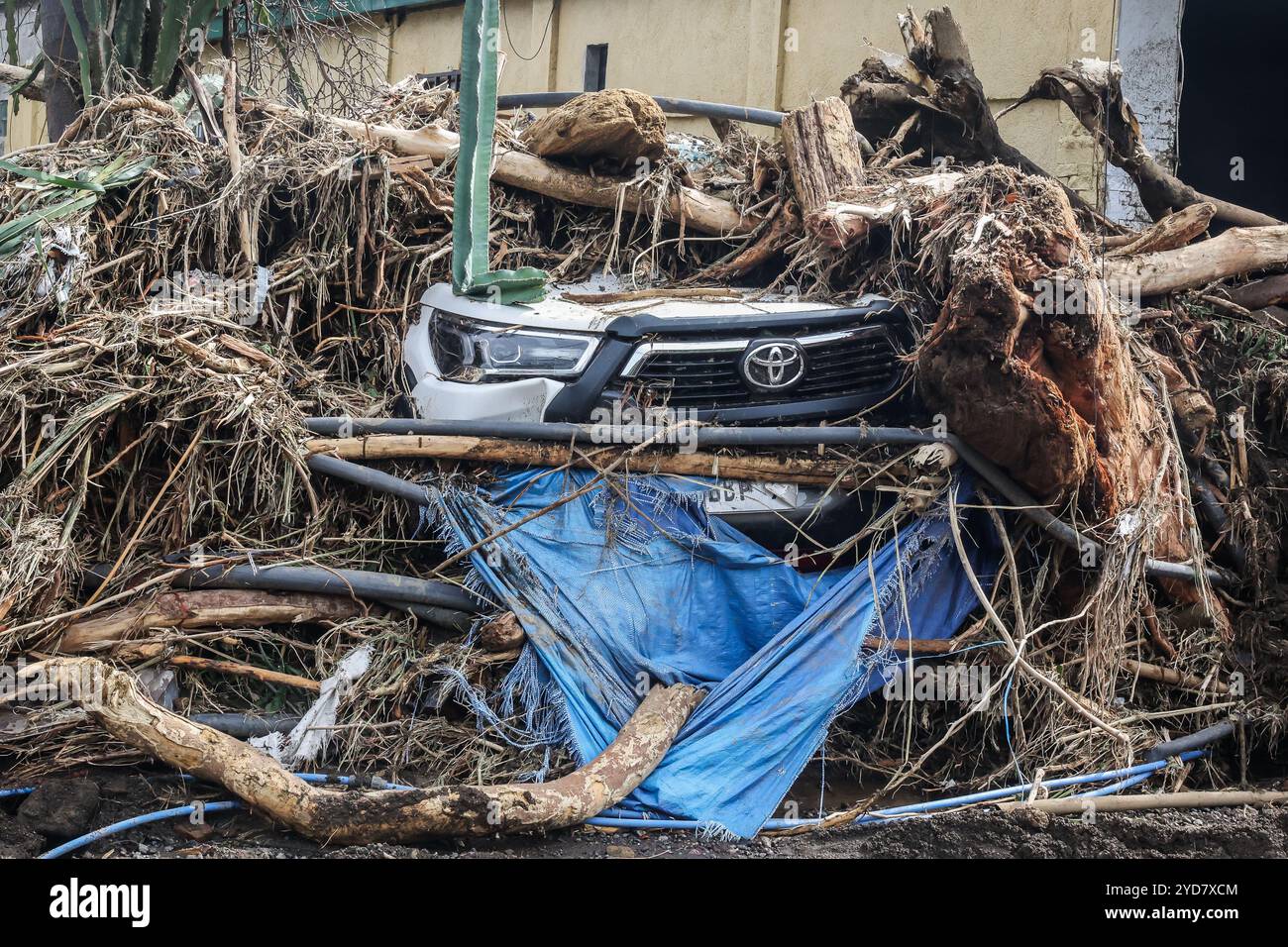 Batangas Province, Philippines. 25th Oct, 2024. A damaged vehicle is ...