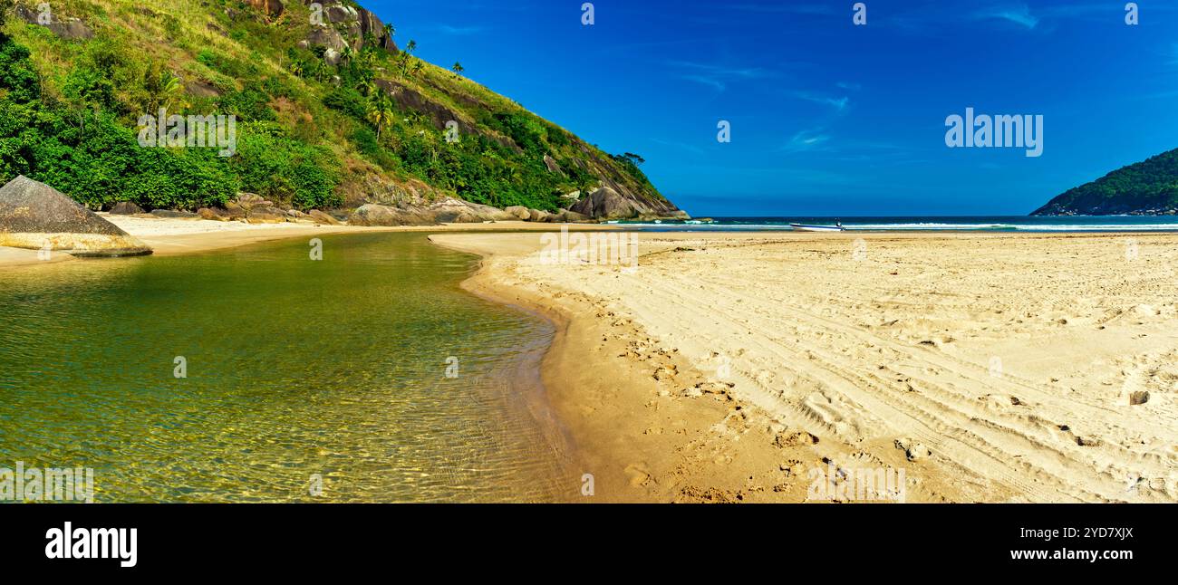 River flowing into the sea, Ilhabela Stock Photo - Alamy