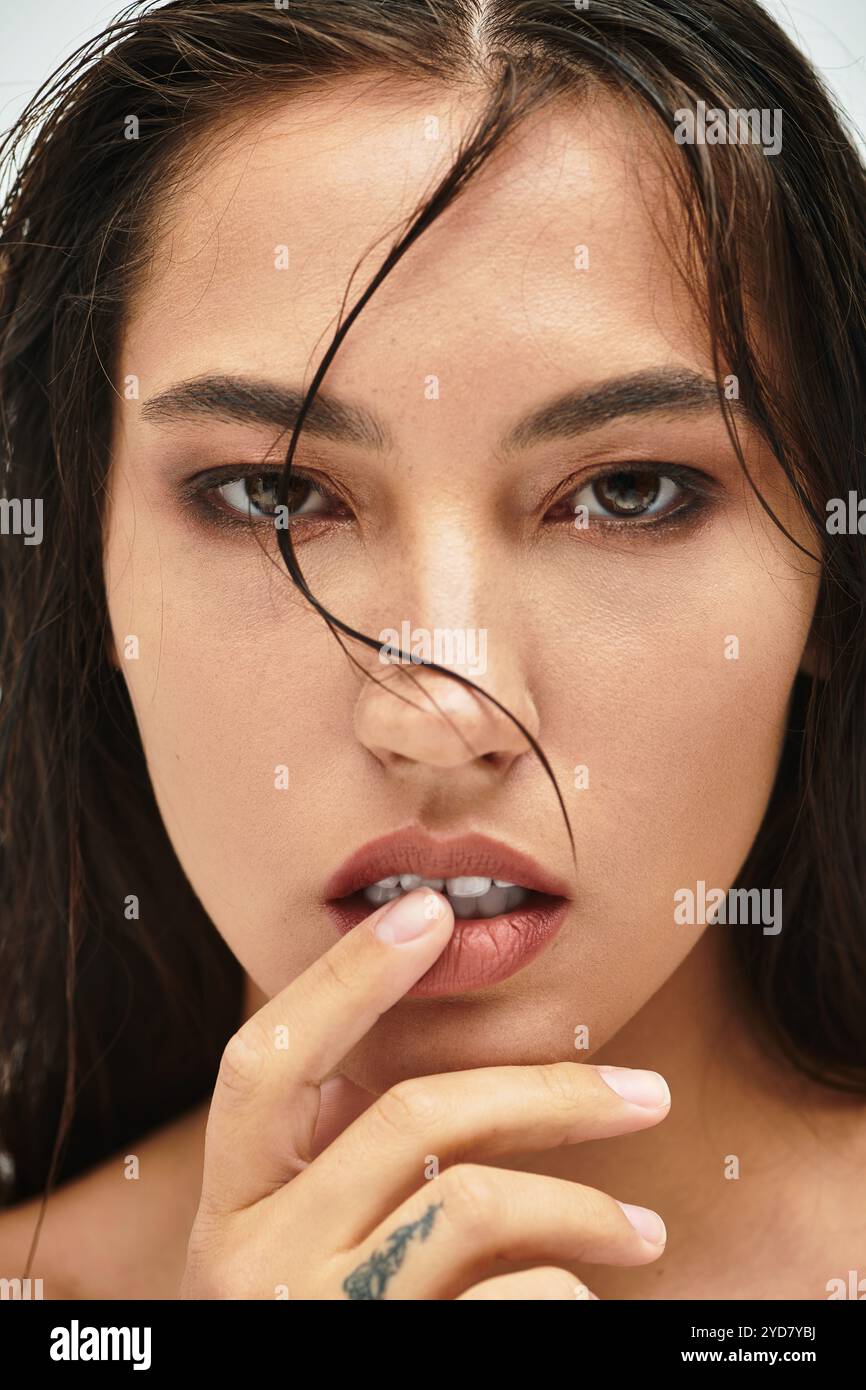 The portrait captures a beautiful woman deep in thought, enhancing her ...