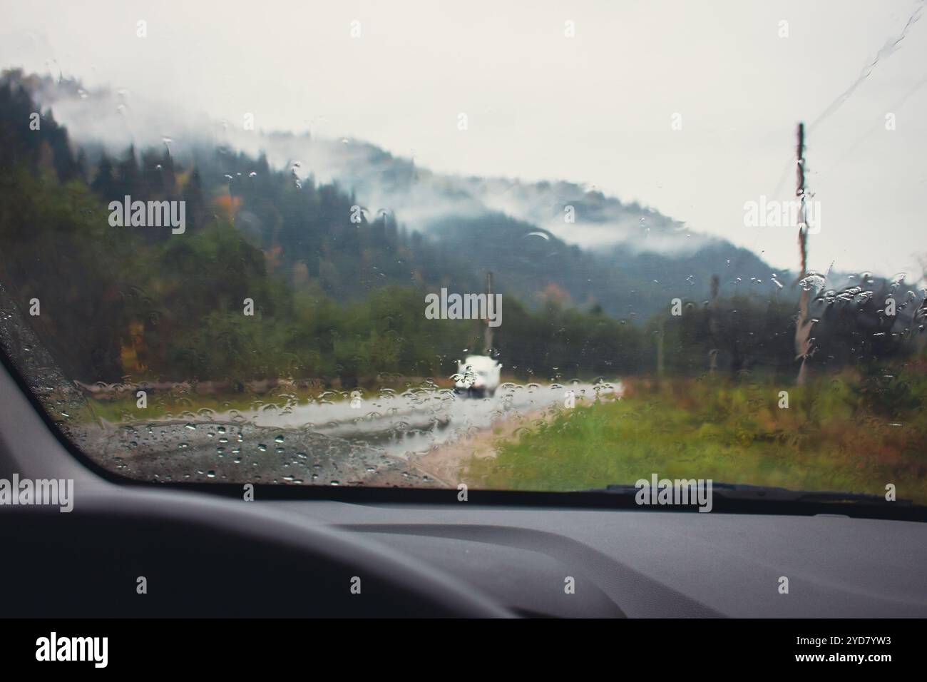 Driving through rain in mountains hi-res stock photography and images ...