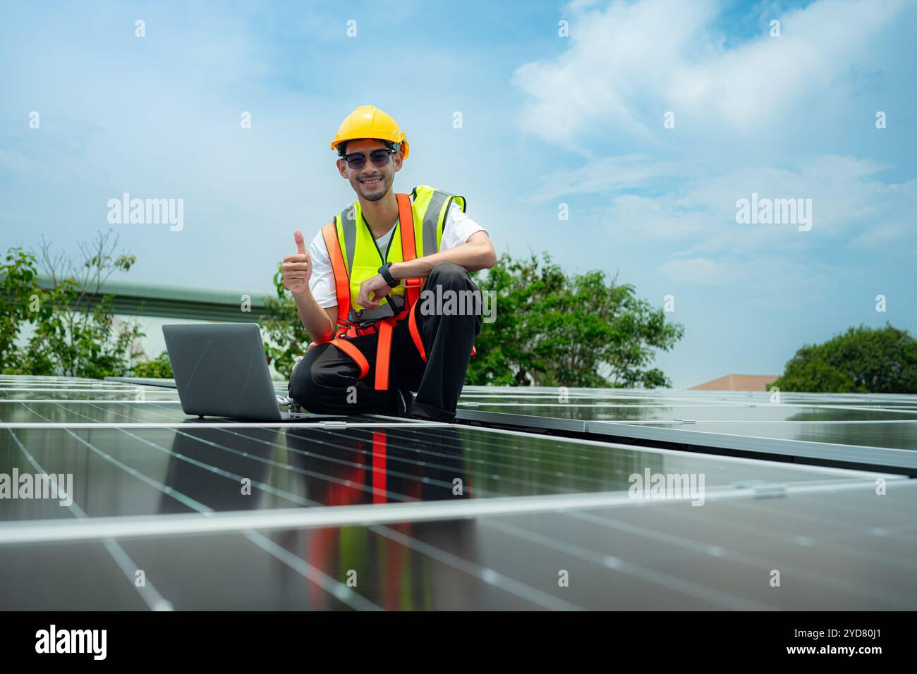 Technician inspects solar panel installation and test the operation of ...