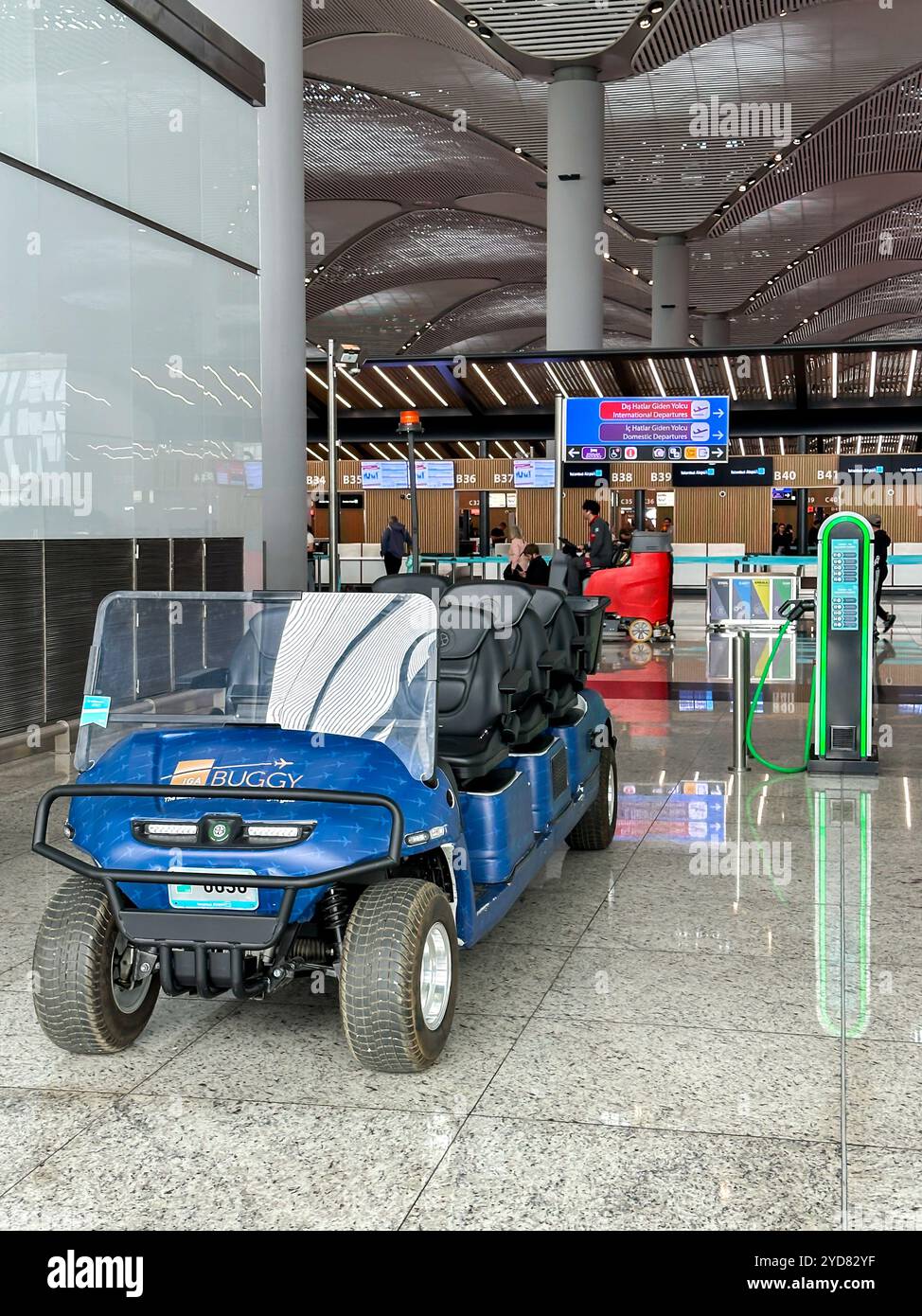 Istanbul, Turkey - April 19, 2024: Electric golf cart and charging ...