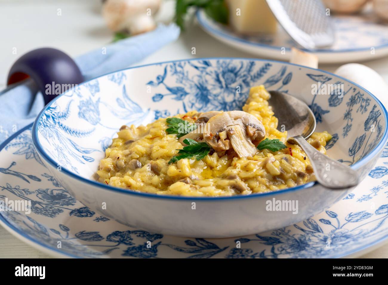 Homemade risotto with mushrooms and saffron Stock Photo - Alamy
