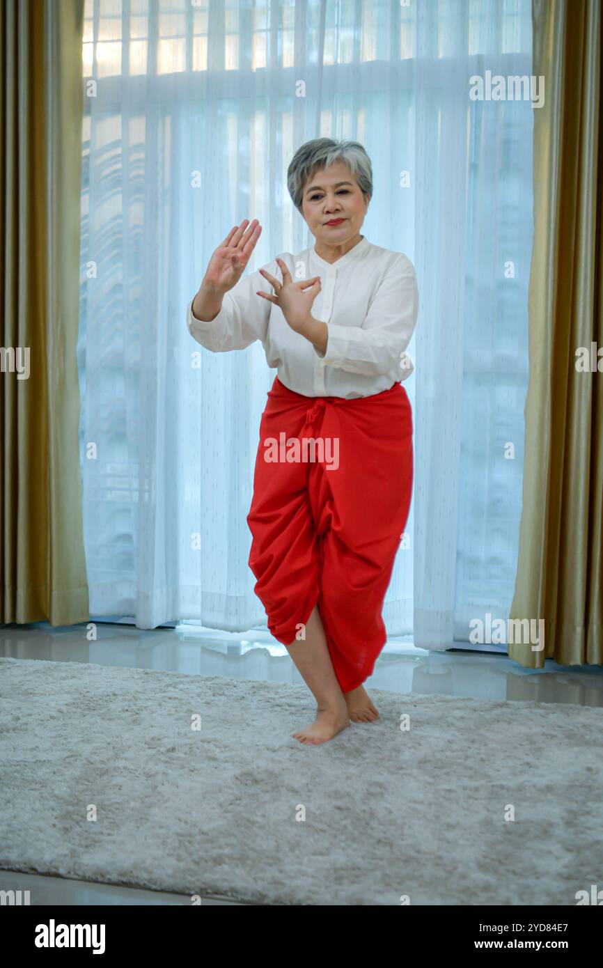 Elderly women relax by practicing traditional Thai dance Stock Photo ...