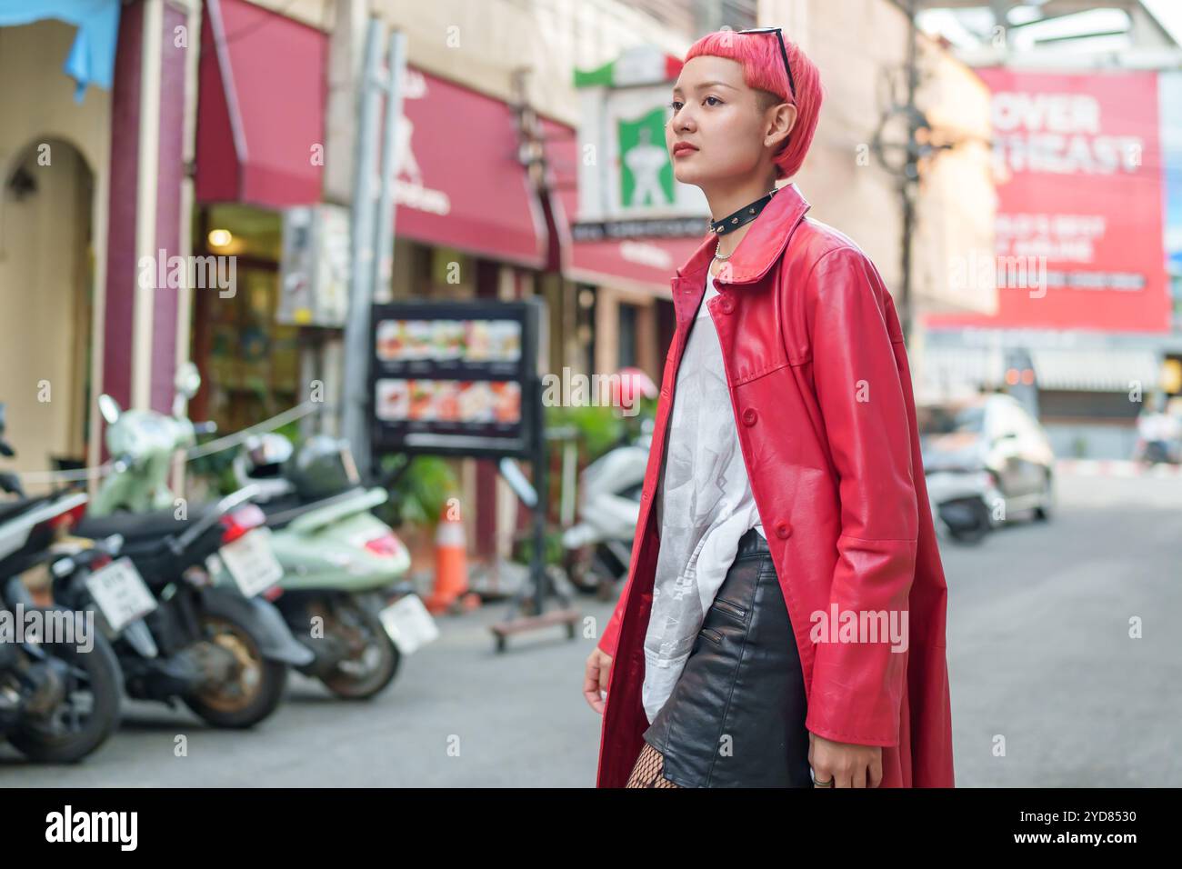 Gen z girl leather fashion with punk Asian woman tourist of local city ...