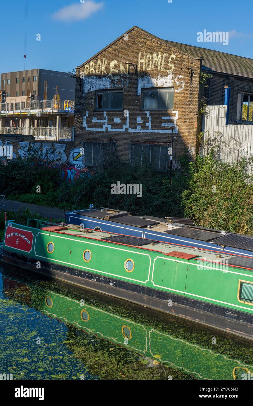 Signs opposing new apartments and offices construction by Lea river ...