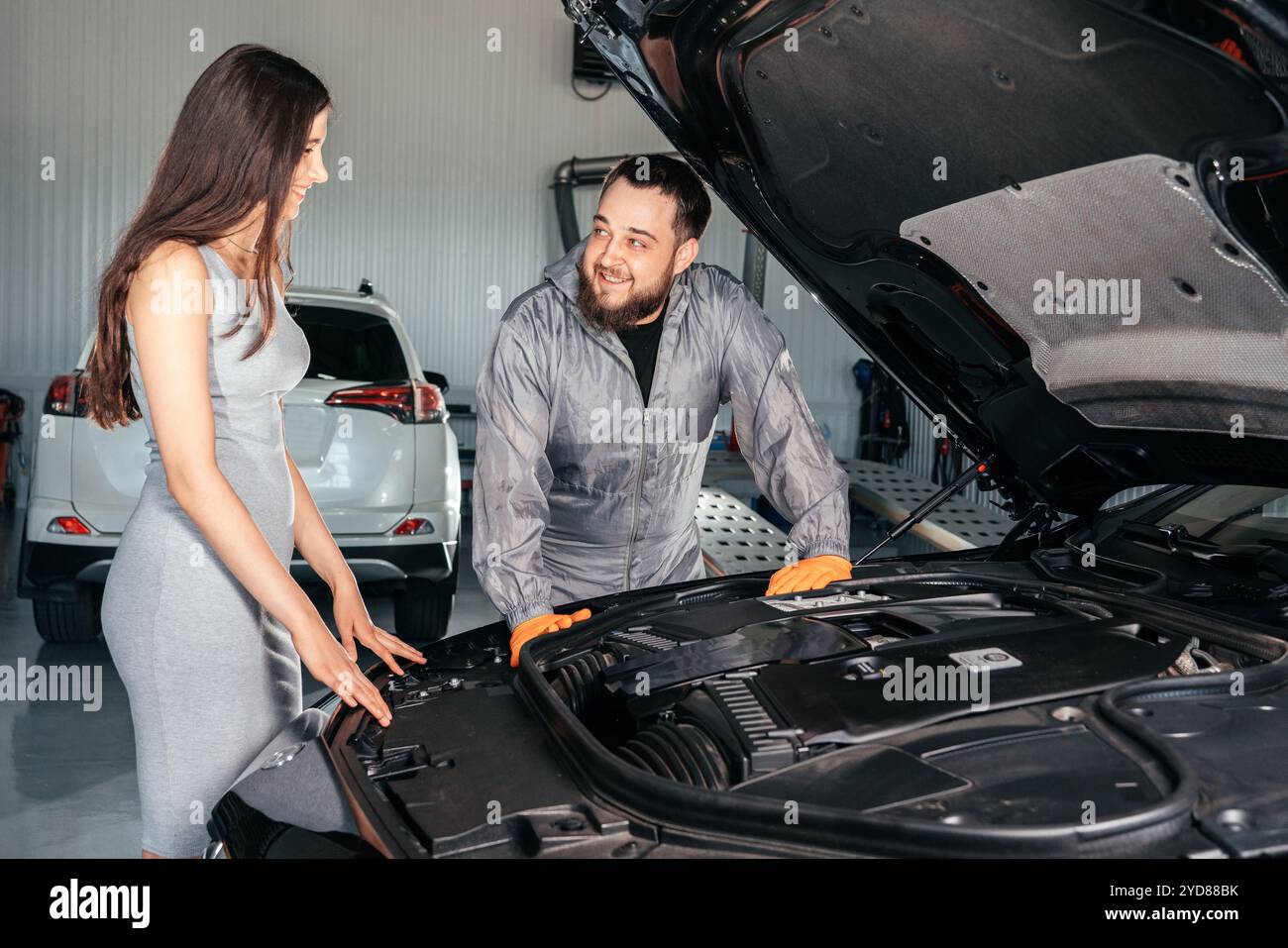 Car owner mechanic stand hi-res stock photography and images - Alamy