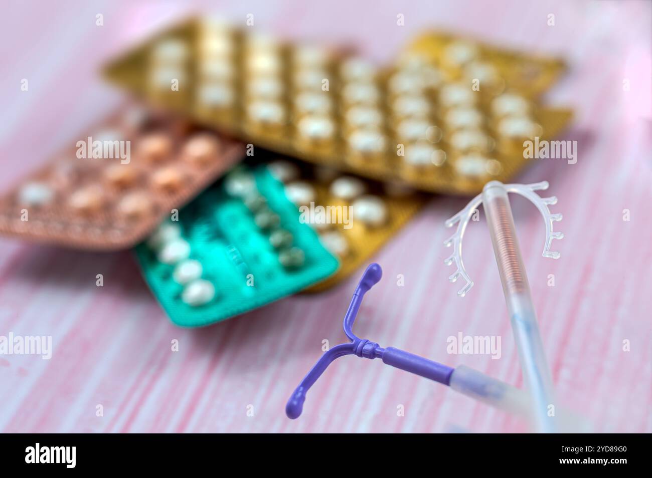 Different methods of contraception: pill and IUD Stock Photo - Alamy