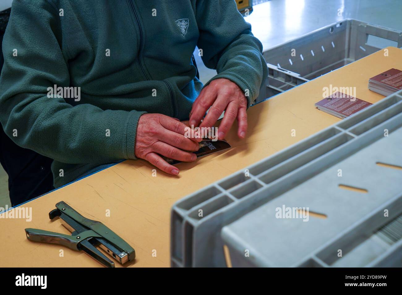 Disabled worker working in the ESAT product packaging workshop ...