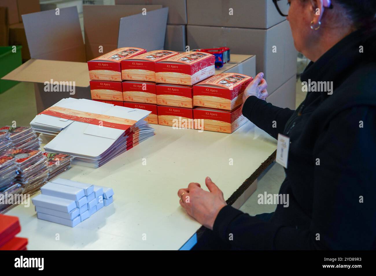 Disabled worker working in the ESAT product packaging workshop ...